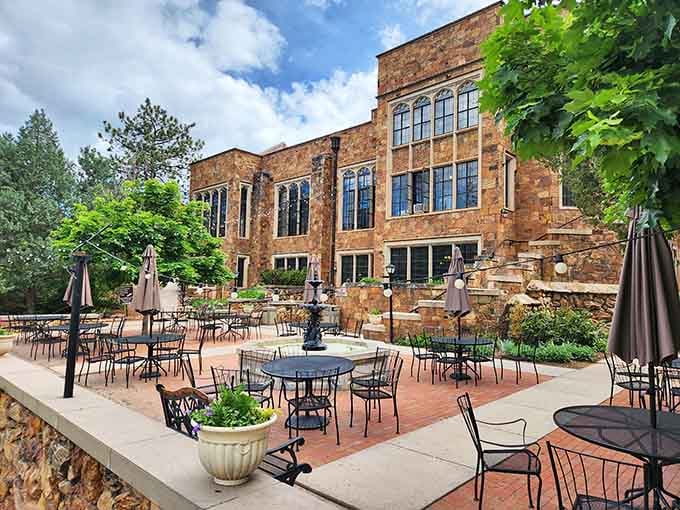 Outdoor dining areas let you enjoy your meals surrounded by red sandstone walls and mountain views.