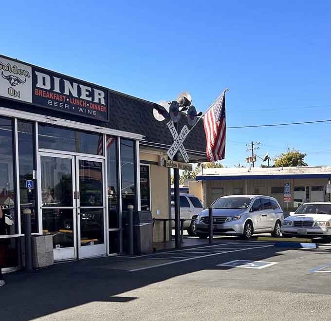 Stars and Stripes wave proudly above the entrance, welcoming hungry travelers to this junction of good food and great memories.