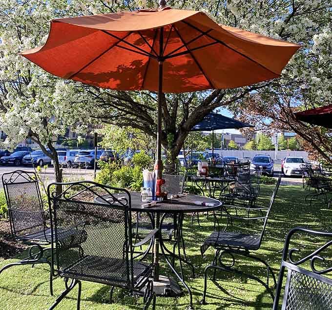 Patio dining under umbrellas where you can enjoy your breakfast while pretending you're somewhere much fancier.
