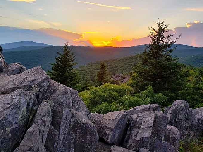 Sunset igniting the sky behind jagged rocks, ending another perfect day in Virginia's high country.
