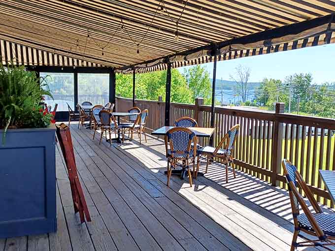The outdoor deck with lake views transforms every meal into a vacation-worthy experience worth savoring slowly.