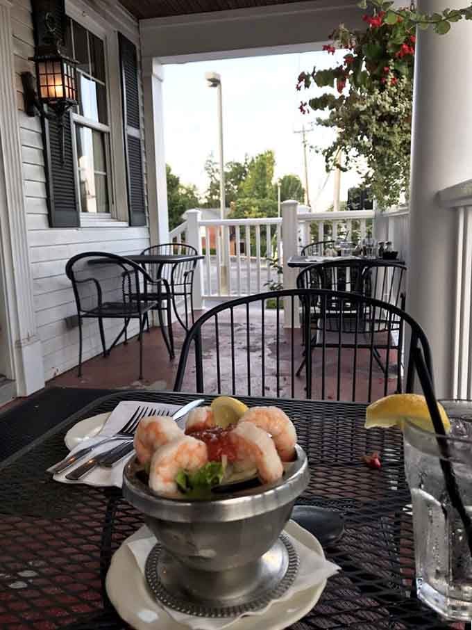 The front patio offers a quieter dining option when weather permits, perfect for enjoying shrimp cocktail outdoors.