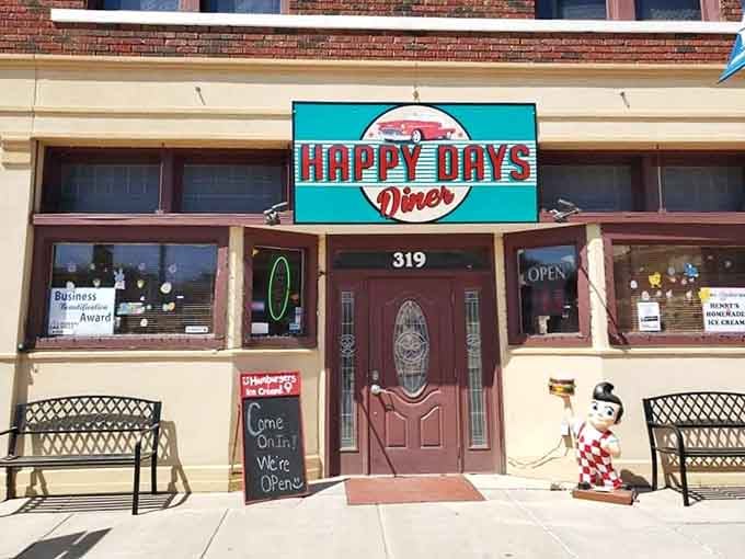 The welcoming exterior complete with retro signage promises good times and great food await inside.