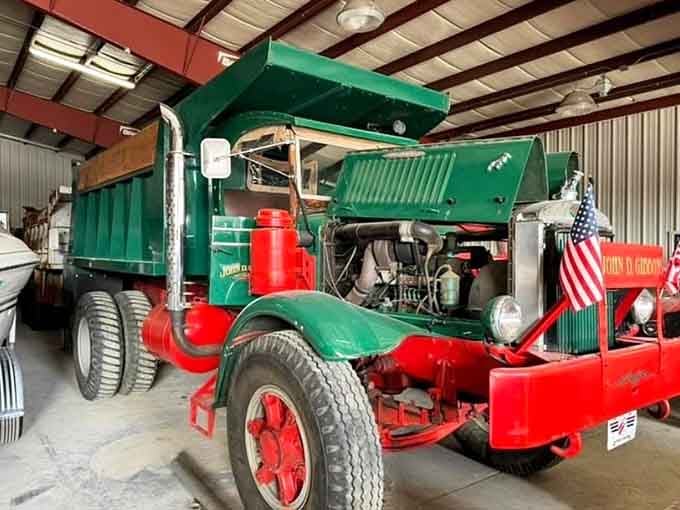 The green and red color scheme on this vintage truck makes it look ready for work.