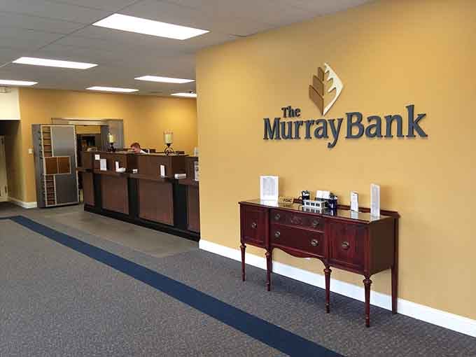 The Murray Bank's interior features antique furniture alongside modern banking, blending practicality with appreciation for the past perfectly.