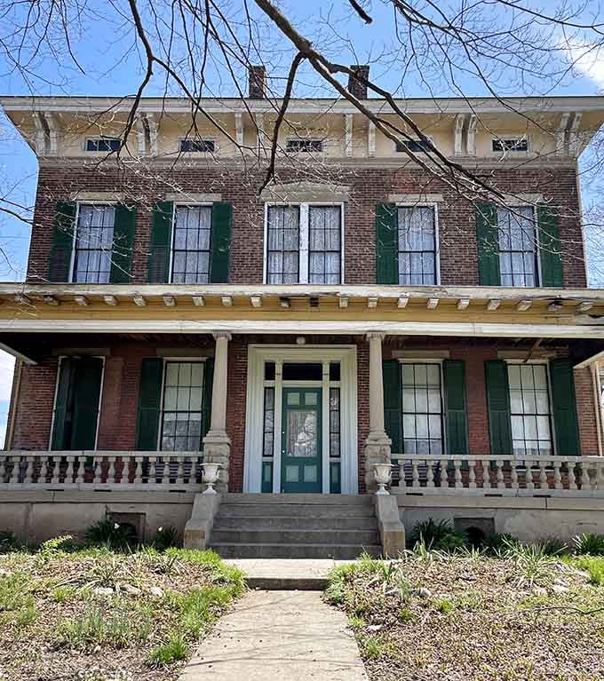 The front entrance welcomes visitors with classic Indiana architecture, though what waits inside might make you reconsider entering alone.