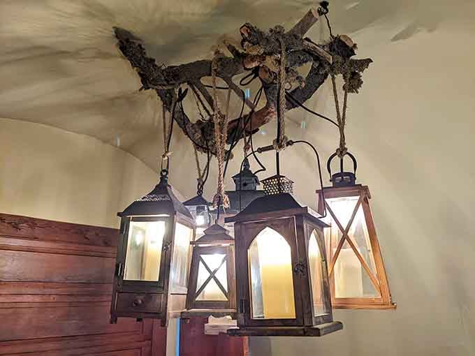 Handcrafted lighting fixtures add warmth and character to every corner of this remarkable retreat.