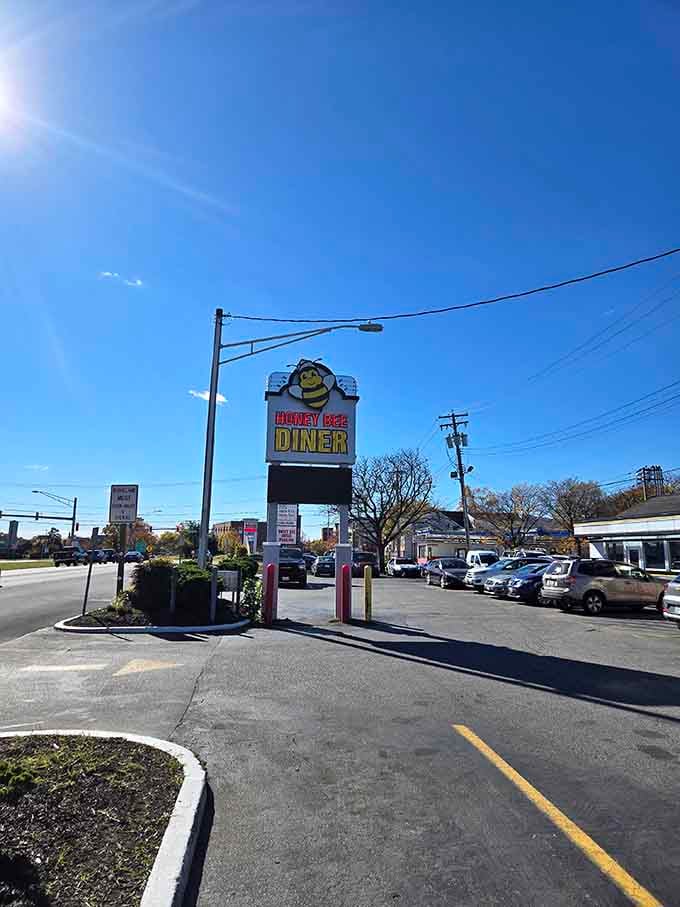 The outdoor sign stands tall, guiding hungry travelers to their next great meal like a delicious lighthouse.