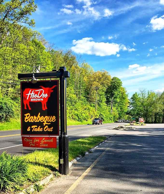 This roadside sign is your beacon of hope, guiding you toward barbecue salvation in the Connecticut countryside.