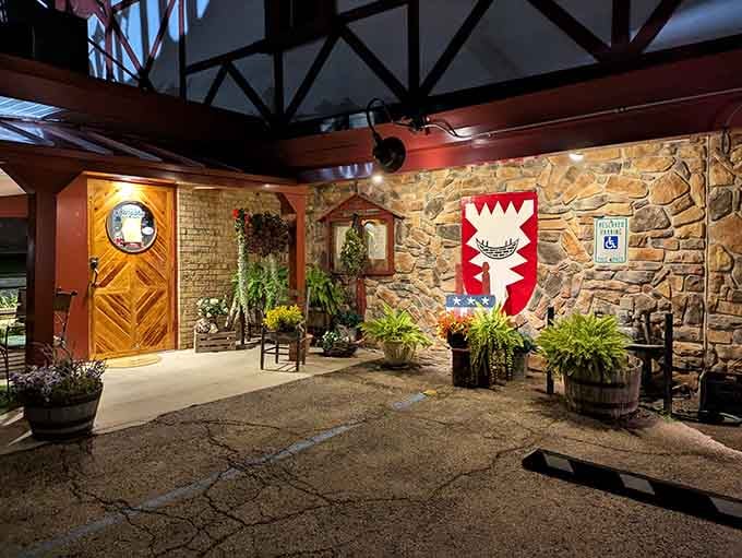 That entrance with its stone archway and coat of arms welcomes you like you're entering a medieval castle for dinner.