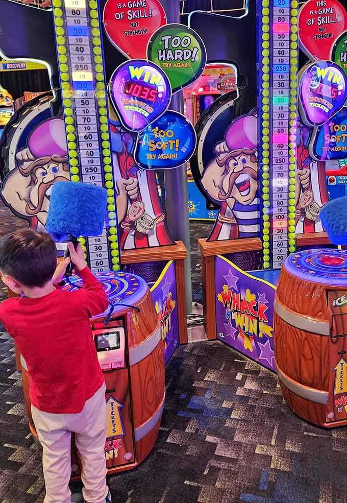 The carnival strength tester challenges kids to ring the bell, proving muscles come in all sizes.