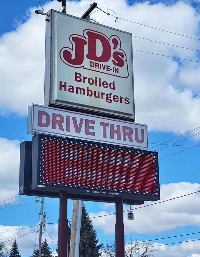 That roadside sign announcing broiled hamburgers like a beacon calling hungry travelers off the highway since forever.