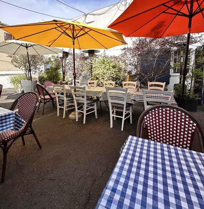 Outdoor patio seating under cheerful umbrellas turns breakfast into an al fresco event worth savoring slowly.