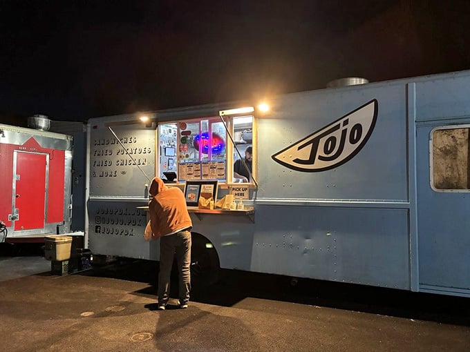Even after dark, that blue truck glows like a delicious lighthouse guiding hungry souls to crispy, golden salvation.