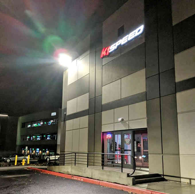 The exterior at night, glowing like a beacon calling to anyone who's ever wanted to go really, really fast.