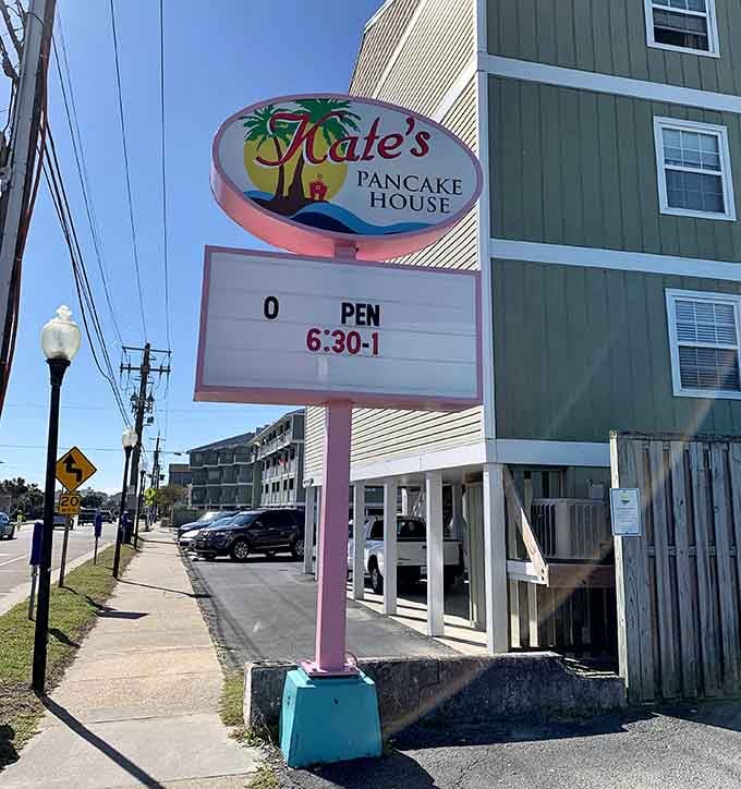 That retro sign announces operating hours like a beacon of hope for hungry souls seeking pancake salvation daily.