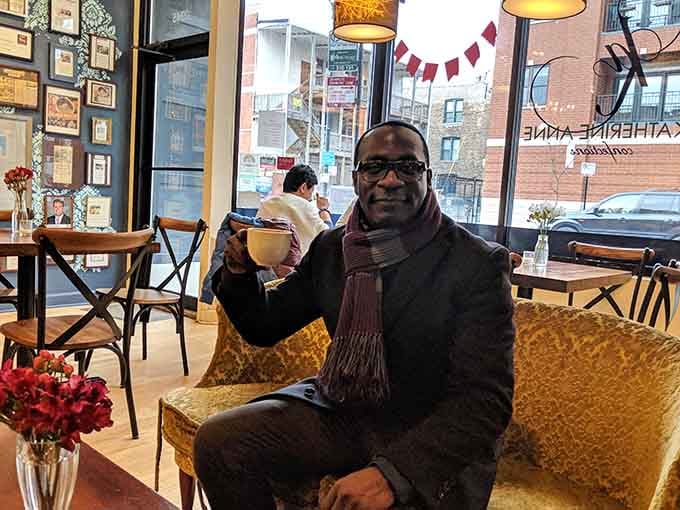 Pure contentment captured in one photo: a satisfied customer enjoying drinking chocolate on a Chicago winter day.