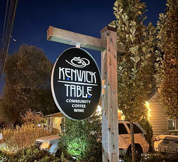 That illuminated sign at dusk promises community, coffee, and wine, which is basically everything you need for a perfect evening.