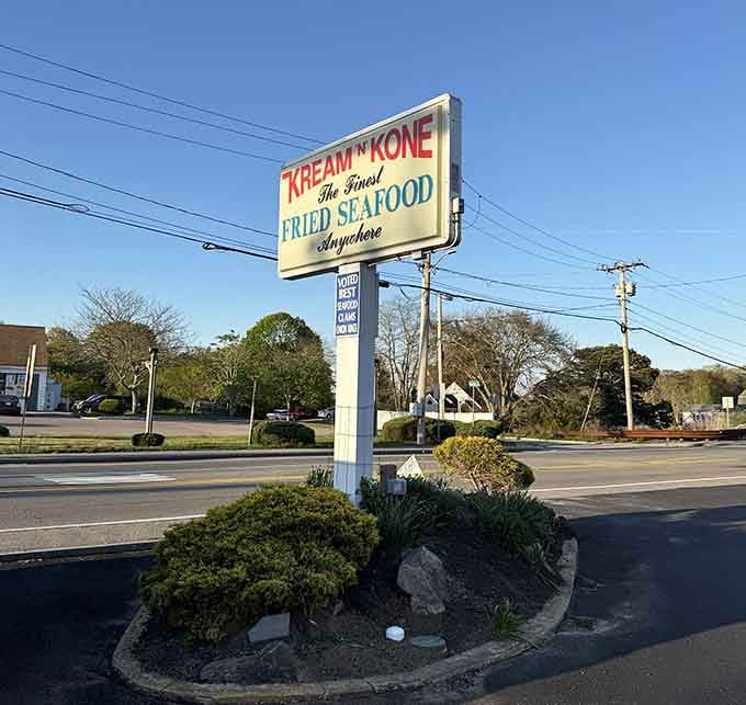 That roadside sign doesn't need fancy graphics when you're advertising "The Finest Fried Seafood Anywhere" with complete confidence.