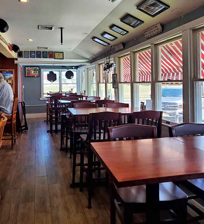 Clean lines, comfortable seating, and those signature red and white awnings visible through the windows remind you exactly where you are: somewhere special.