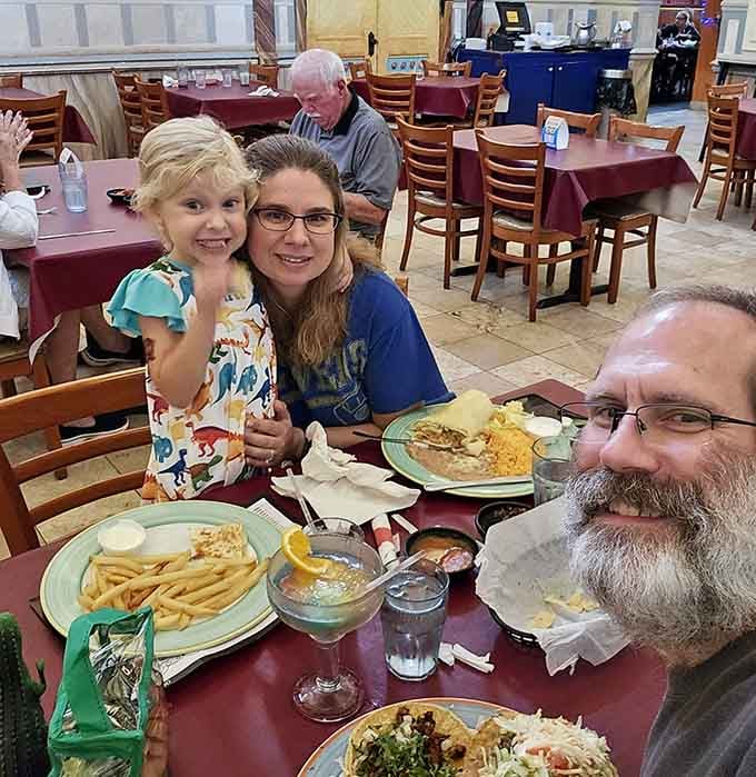 Three generations sharing a meal together, because the best restaurants create memories that last longer than the food itself.