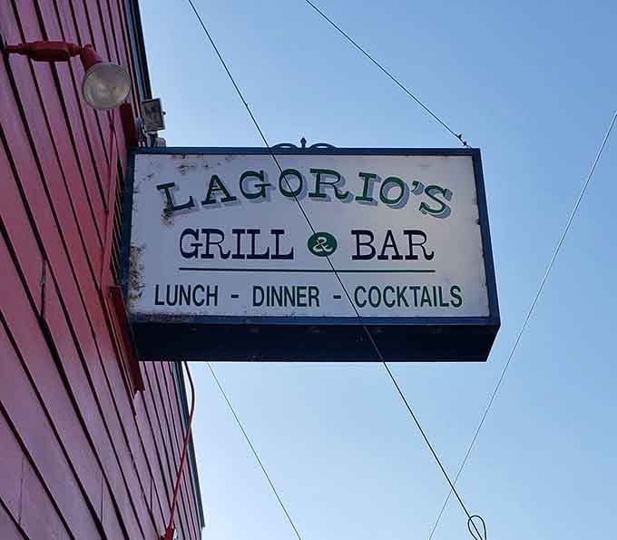 That vintage sign promises lunch, dinner, and cocktails, delivering on every single word with consistent excellence.