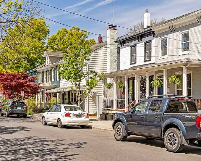 Residential areas maintain their historic charm while modern cars remind you this isn't actually a time machine experience.