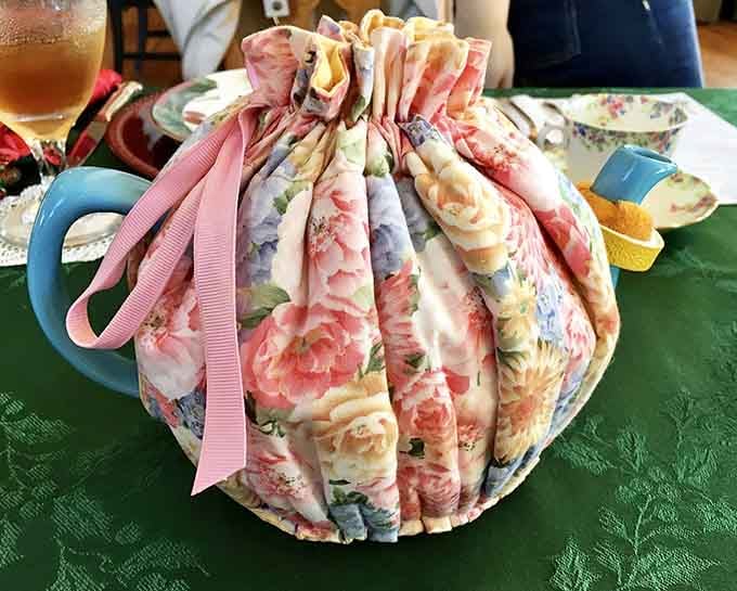 This floral fabric teapot cozy is the kind of charming detail that makes Laura's Tea Room truly special.