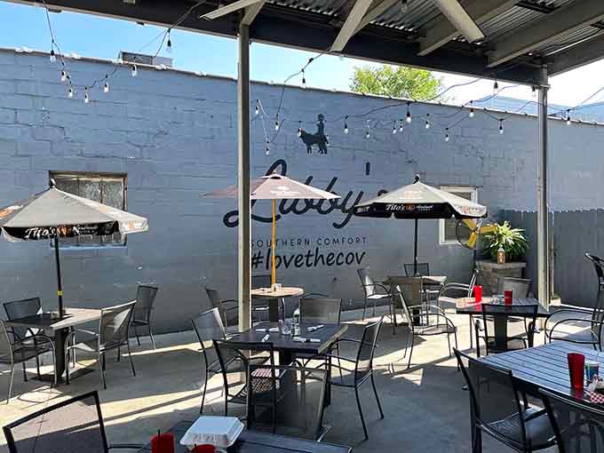 The patio offers outdoor dining perfection, where string lights and good food make every meal feel like celebration.