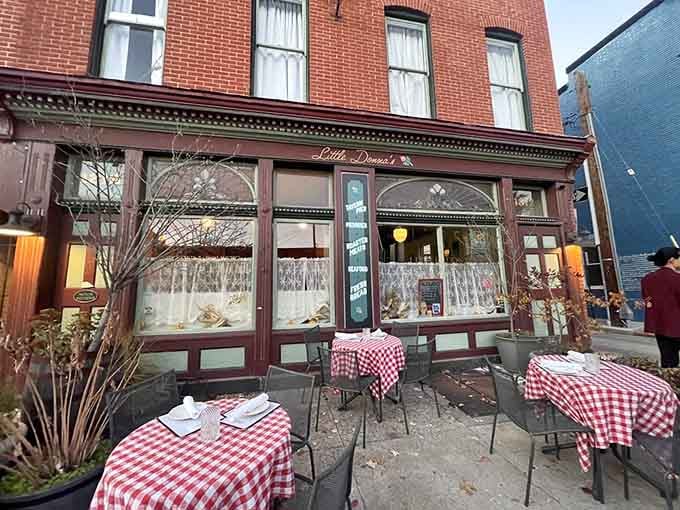 Red-checkered cloths flutter in the breeze outside, inviting passersby to discover what locals have known all along about this gem.