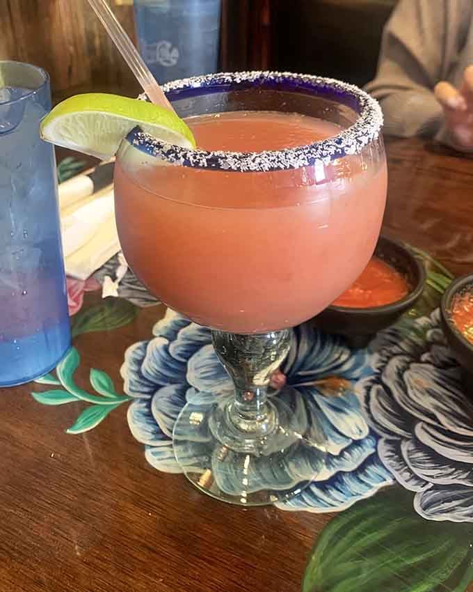 A perfectly salted margarita rim and that peachy-pink color make this the kind of drink that improves any day exponentially.