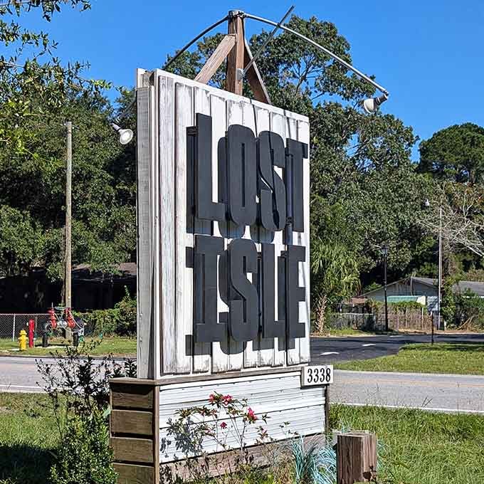The roadside sign for Lost Isle stands proud, beckoning travelers to discover what locals already know about this gem.