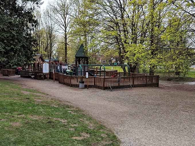 Tree-shaded playgrounds where childhood happens the old-fashioned way, minus the constant screen time battles.