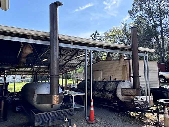 Those well-seasoned smokers standing guard like sentinels of flavor have seen more briskets than most folks have had hot dinners, and they're just getting started.