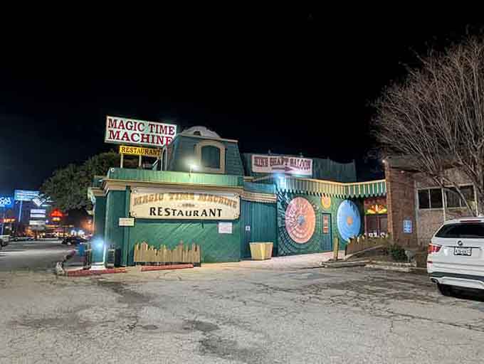 The exterior at dusk looks like a carnival decided to settle down and serve ribeyes instead.