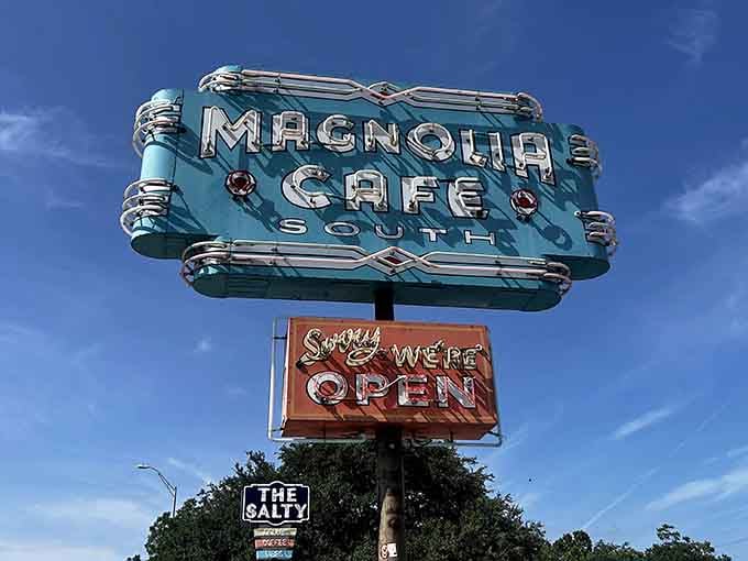 That vintage neon sign isn't just advertising; it's a landmark, a promise, and an Austin institution all rolled into one.