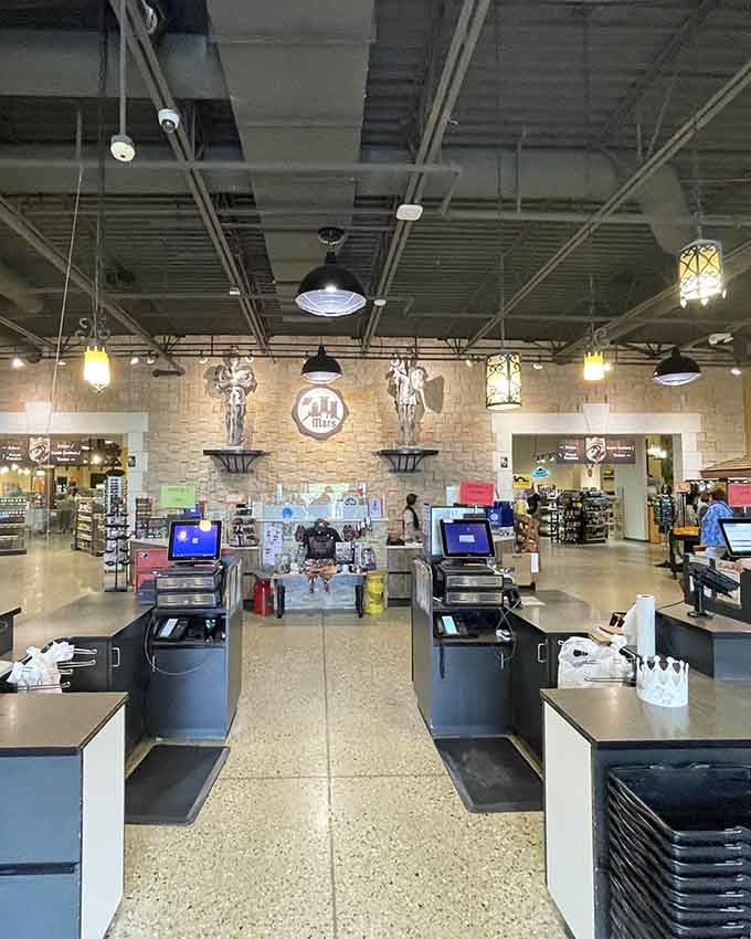 Even the checkout counters maintain the medieval aesthetic, because consistency matters when you're building cheese empires.