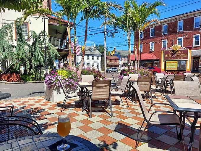 Outdoor seating with palm trees in Pennsylvania proves that history and tropical vibes can coexist peacefully.