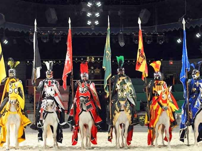 Six knights on horseback carrying their colors, ready to compete for your cheers and your section's undying loyalty tonight.