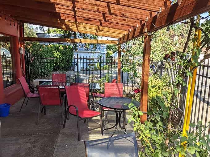 Outdoor seating under the pergola where sunny Portland days taste even better with good food nearby.