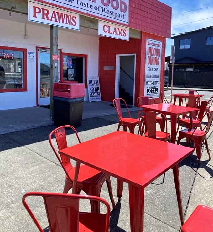 Bright red tables where you can enjoy your meal while the ocean breeze tries to join you.