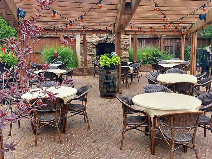 String lights transform the patio into an enchanting outdoor dining space for Kentucky's beautiful evenings.