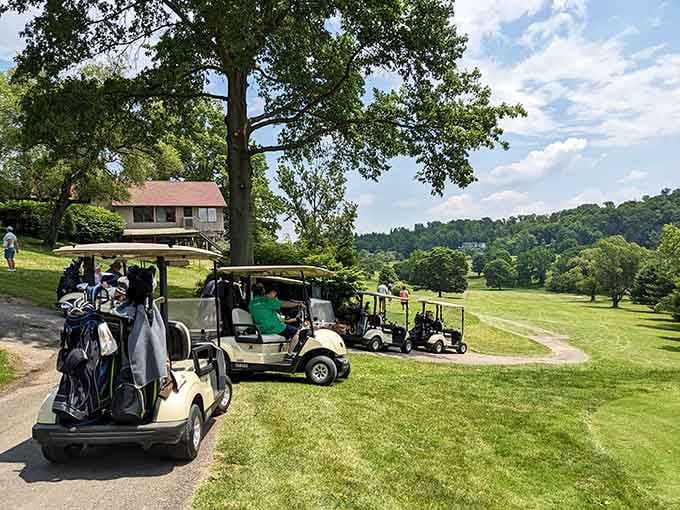 Golf carts line up at Fire Ridge where rolling hills provide both challenging play and views that beat any country club.