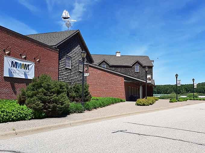 That sailboat weathervane points visitors toward riverside galleries where art and landscape merge seamlessly together.