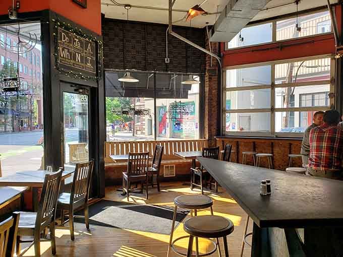 Natural light floods the dining room, illuminating the periodic table menu and creating the kind of warm ambiance that keeps regulars coming back.