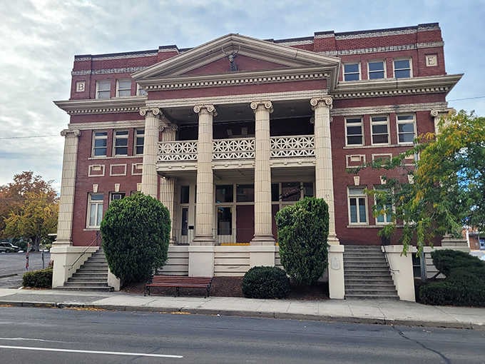 The stately exterior building houses these glowing treasures, a classical temple protecting America's neon heritage within its walls.