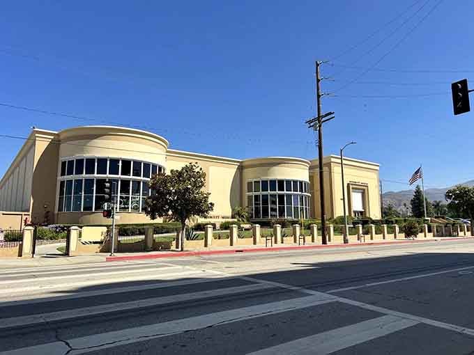 The building's Art Deco curves mirror the elegant lines of the automobiles housed within, creating perfect architectural harmony.