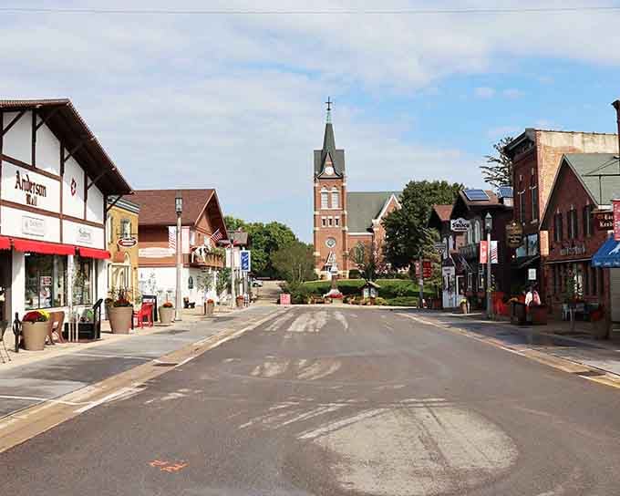 Main Street stretches toward the church tower, inviting exploration of this delightfully authentic Alpine village.