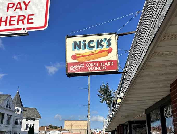 The outdoor sign promises Original Coney Island Weiners, and unlike most promises, this one delivers spectacularly every single time.