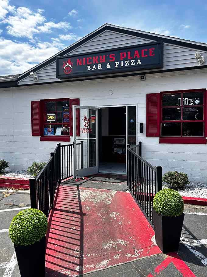 The entrance welcomes you with a red carpet treatment, literally, setting the tone for what's inside.